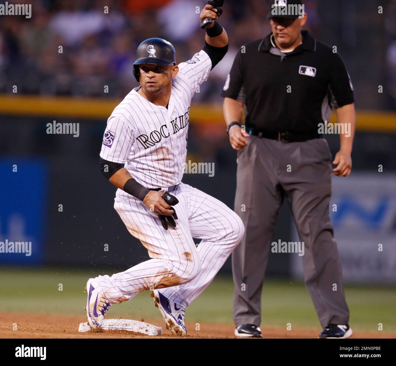 Colorado Rockies' Gerardo Parra, left, steals second base against ...