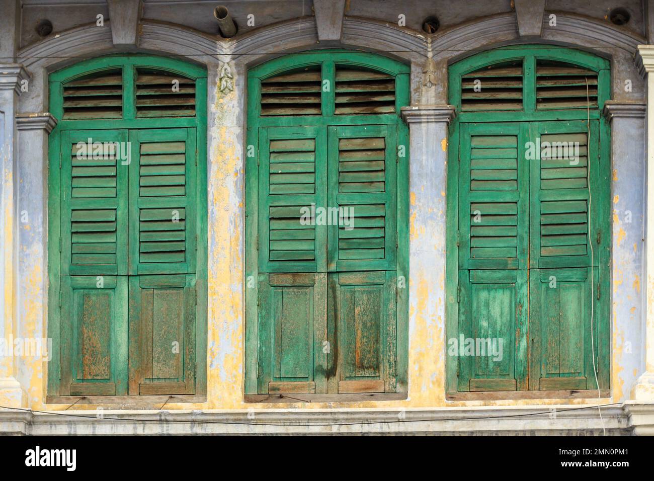 Beautiful ruined vintage wooden windows of an old Chinese shop house in ...