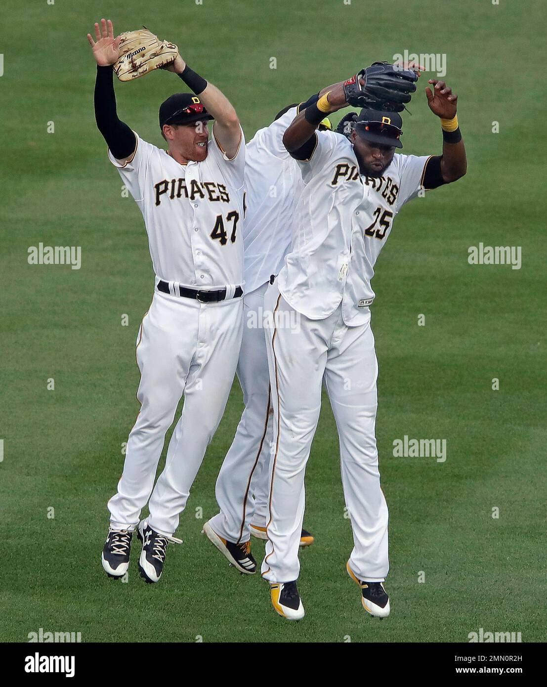 Pittsburgh Pirates outfielders Jordan Luplow (47), Starling Marte, rear ...