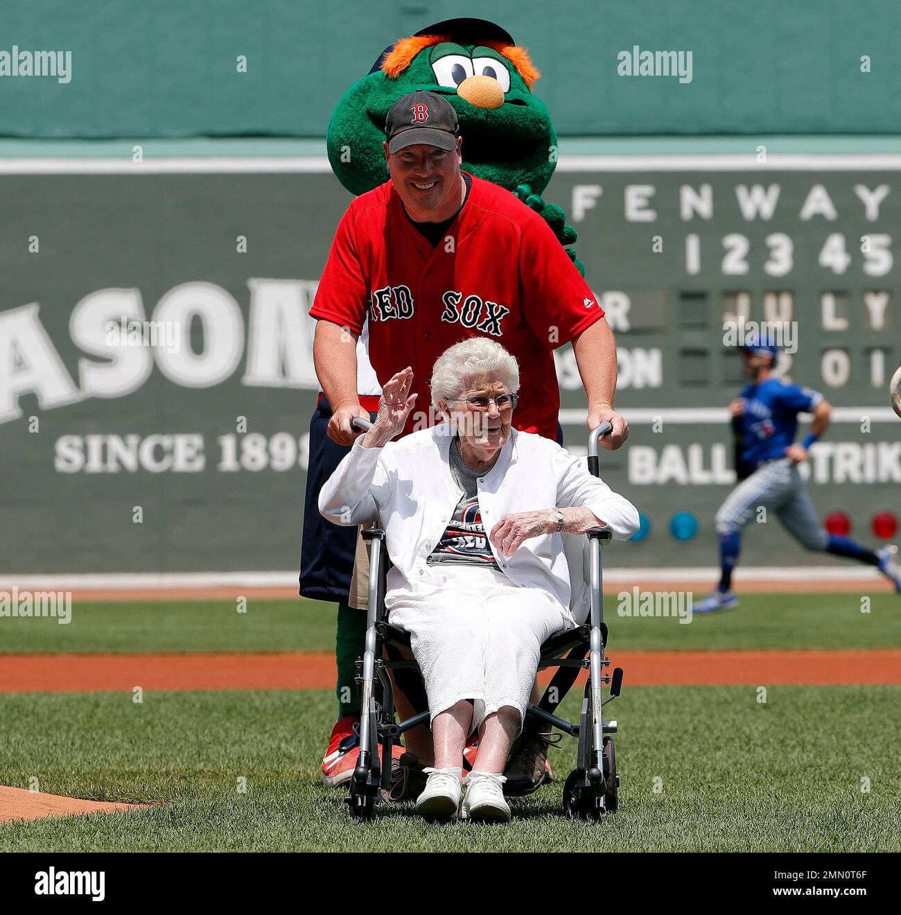 106 Year Old Juliette Campbell Waves As She Is Pushed Off The Field By Her Grandson Craig