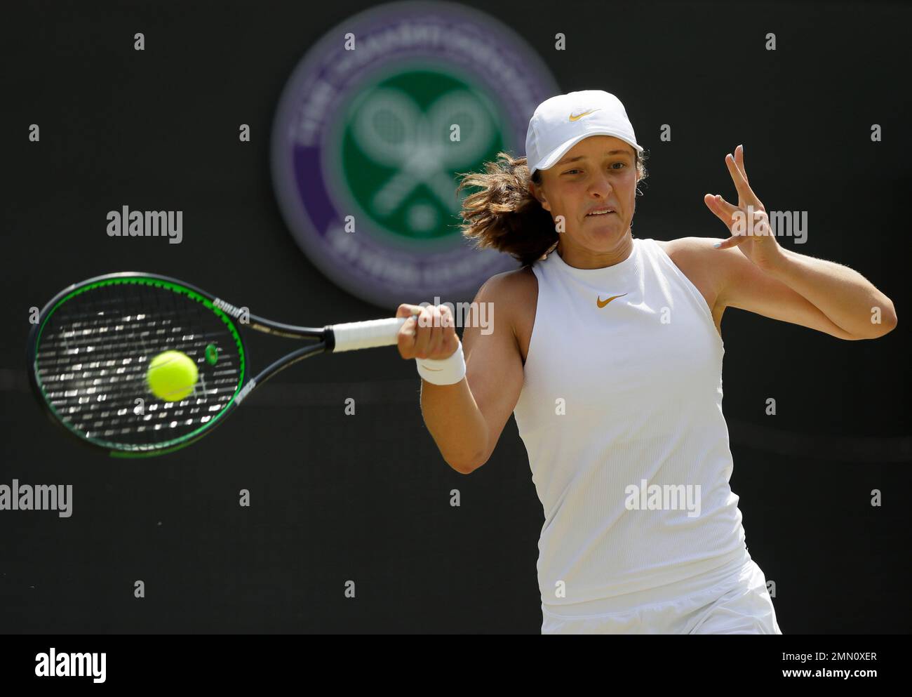 Iga Swiatek of Poland plays a return to Leonie Kung of Switzerland ...