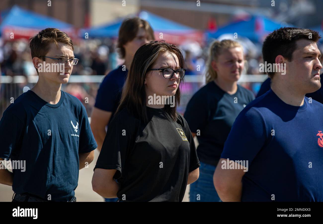Carah Burkholder (center), a resident from Wichita, Kansas, forms for a ...