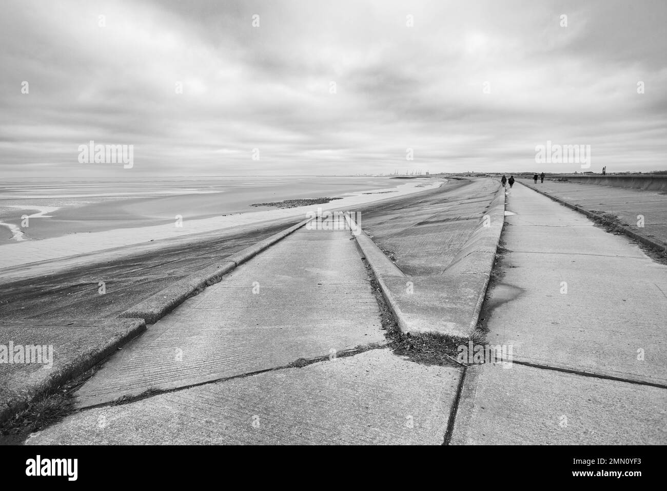 A straight line leads down to the beach at Meols on the Wirral as it ...