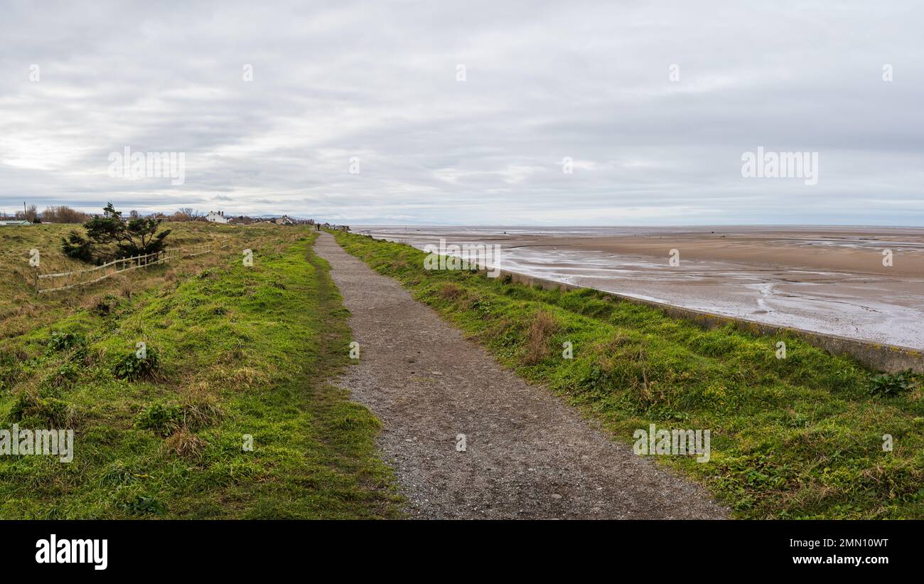 A pathway captured between the promenade at Meols beach and the Meols ...