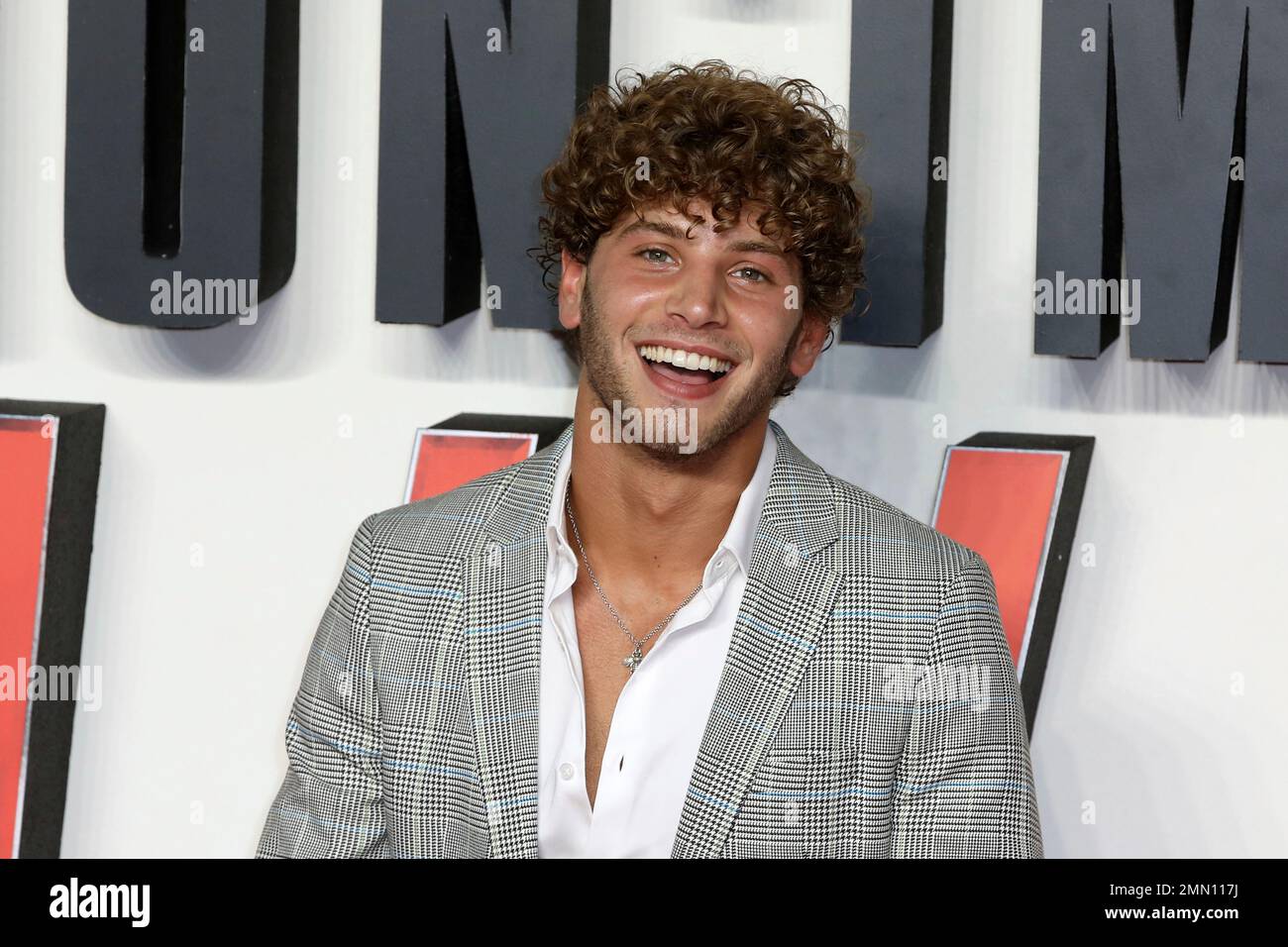 Model Eyal Booker poses for photographers on arrival at the premiere of ...