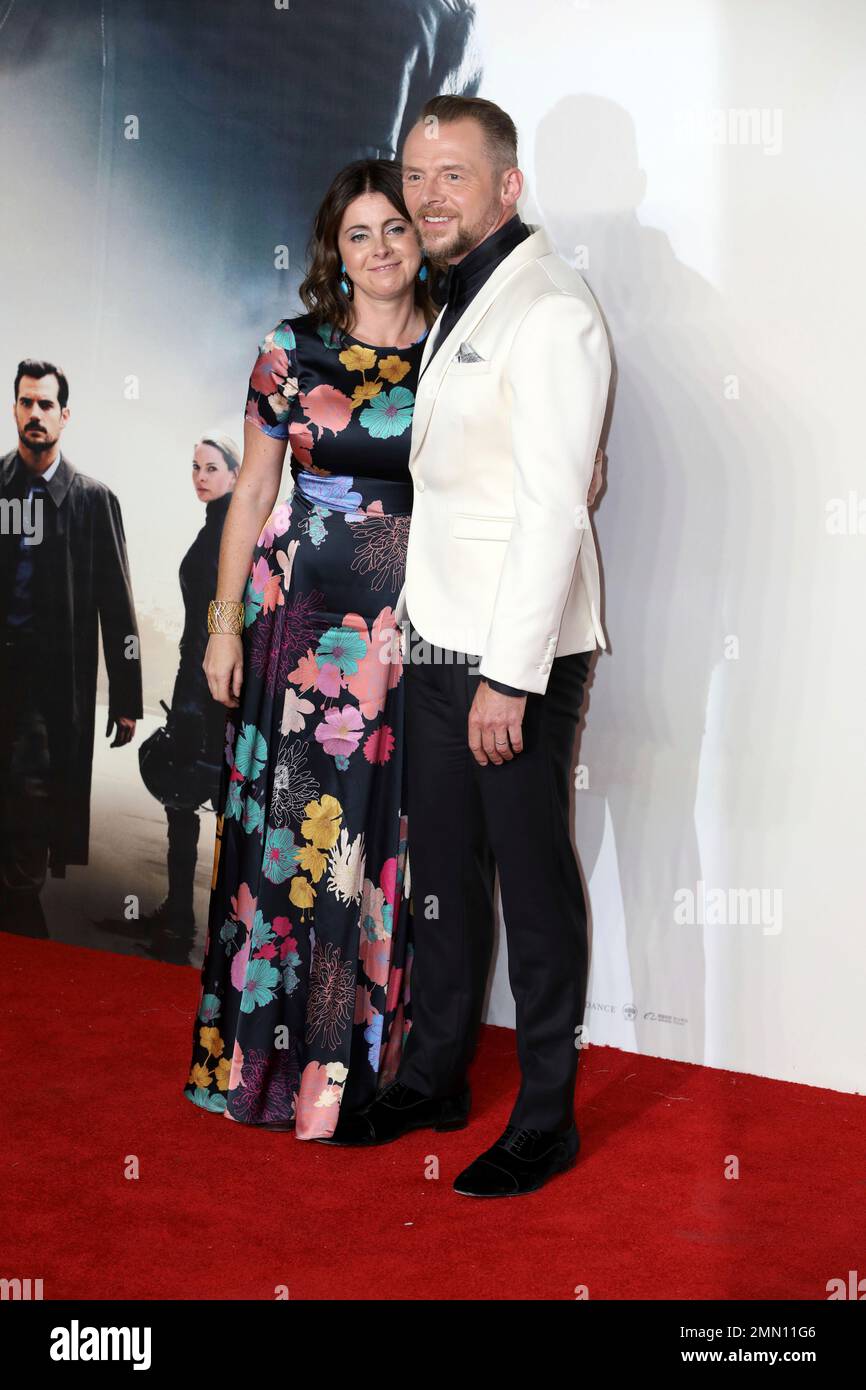 Actor Simon Pegg and partner Maureen Pegg pose for photographers on ...