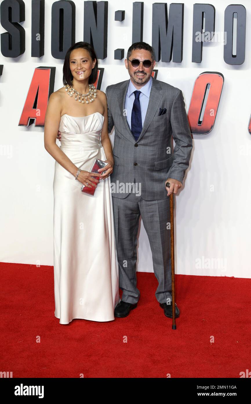 Film Producer Jake Myers and partner Kea Wong pose for photographers on ...