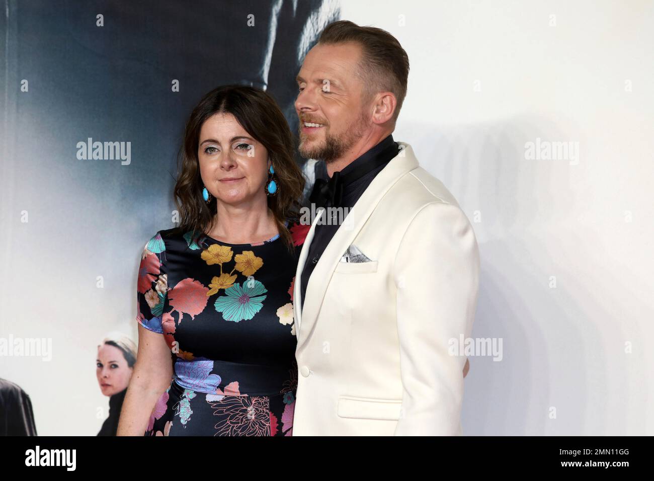 Actor Simon Pegg and partner Maureen Pegg pose for photographers on ...