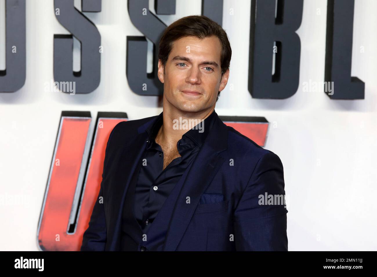 Actor Henry Cavill poses for photographers on arrival at the premiere ...