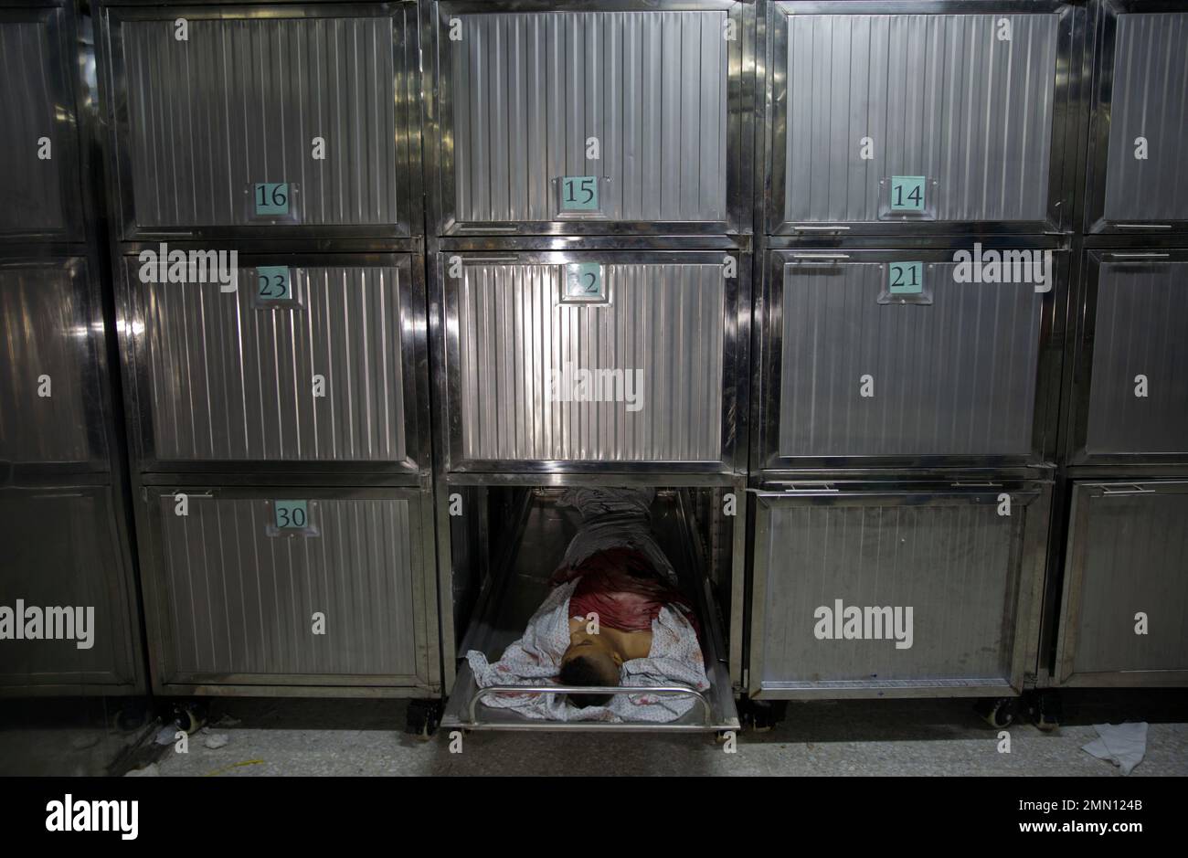 The body of 15-year-old Othman Hellis, lies in the morgue of the Shifa ...