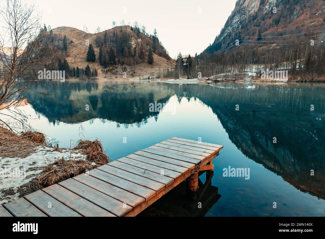 A mountain lake landscape in the Alps with turquoise water with a ...