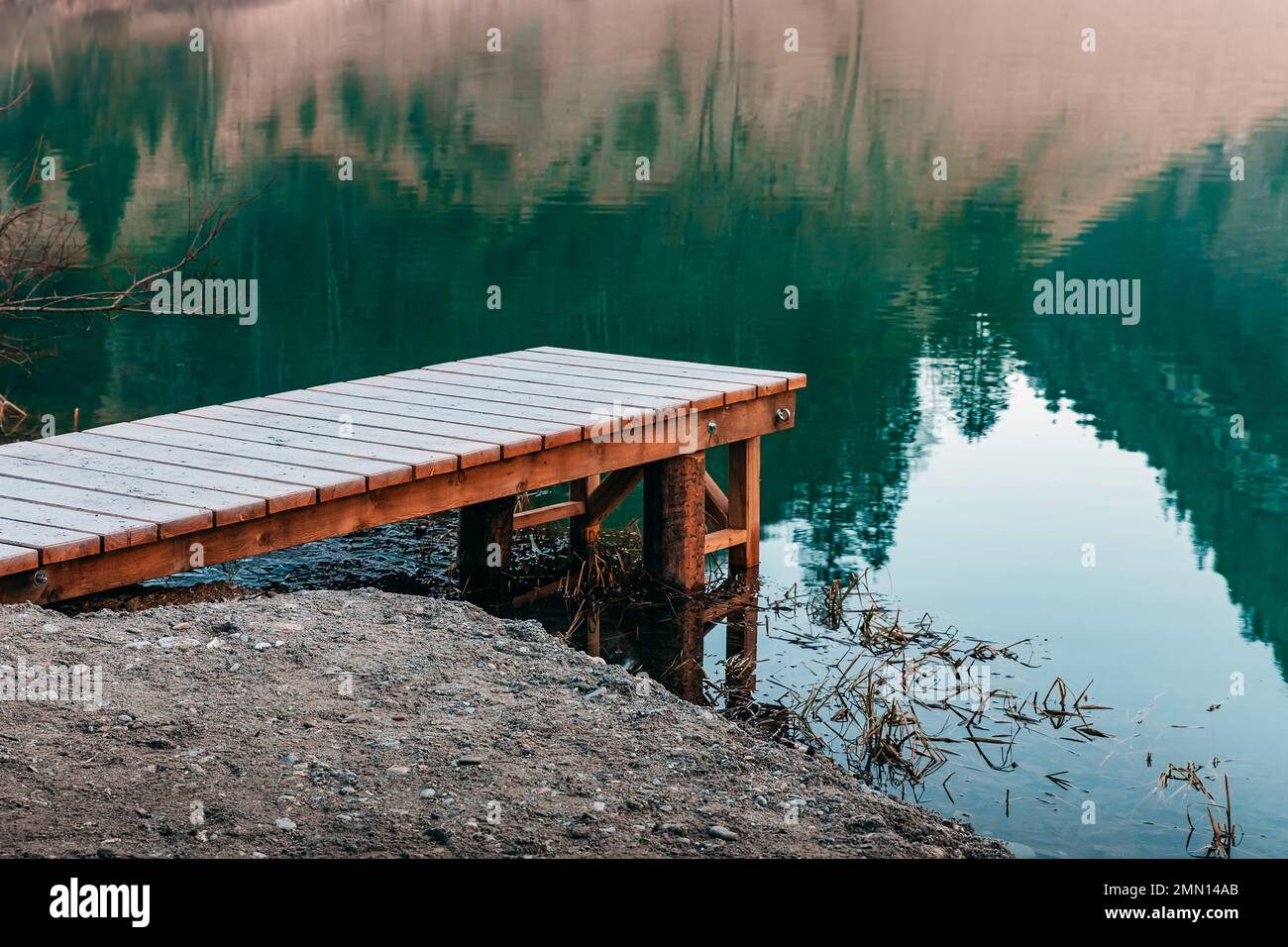 A mountain lake landscape in the Alps with turquoise water with a ...