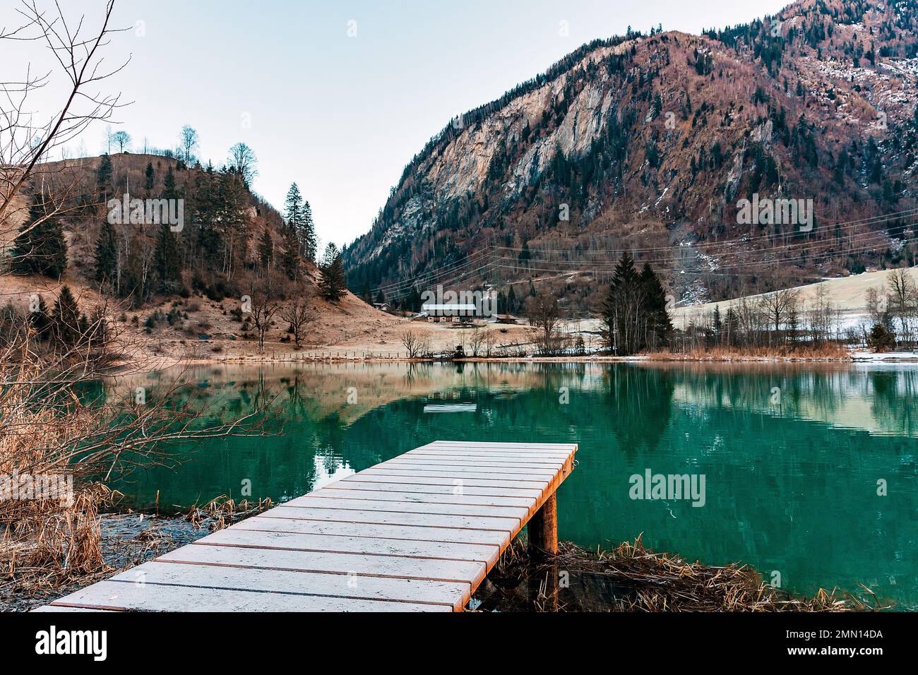A mountain lake landscape in the Alps with turquoise water with a ...