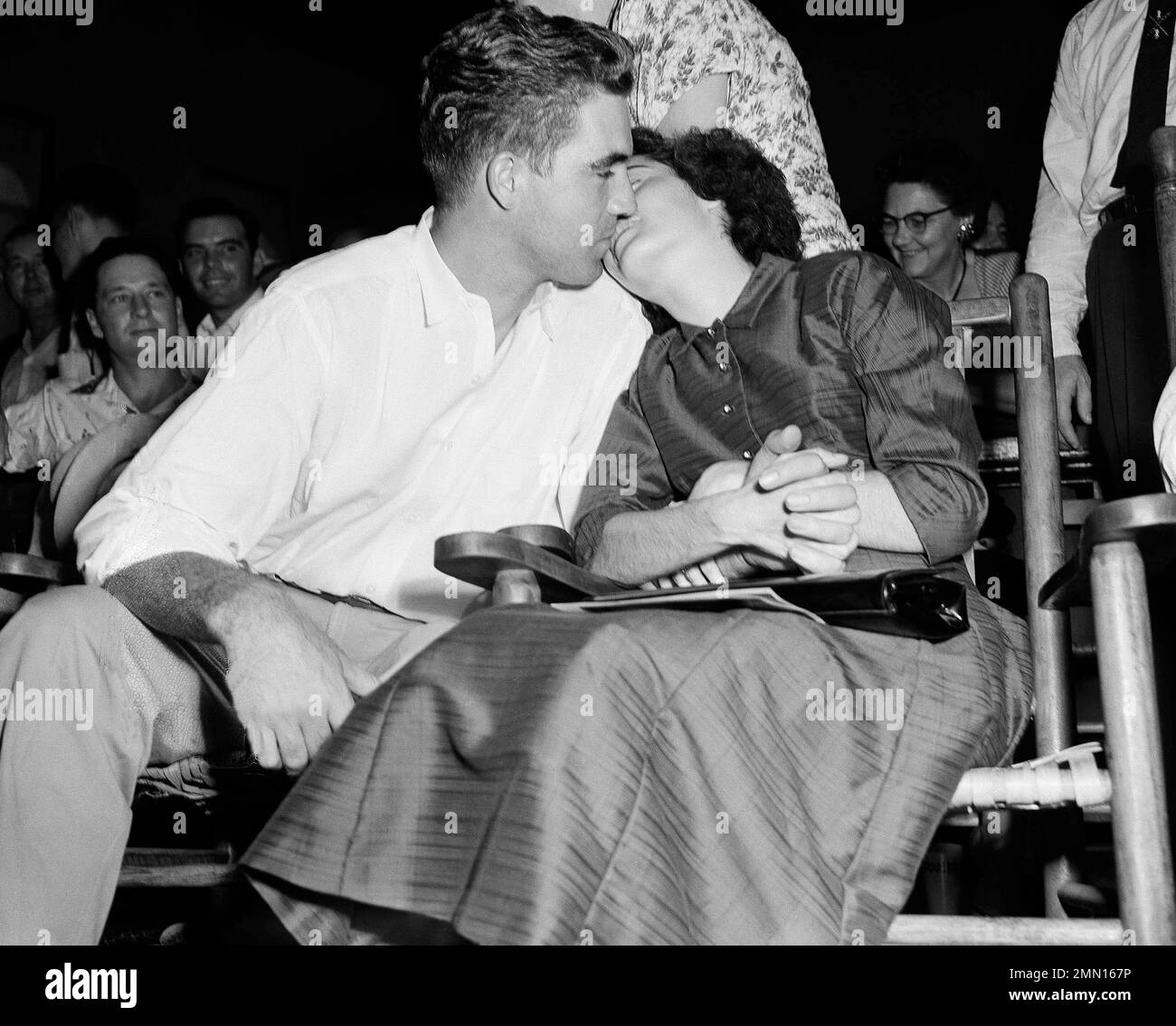 Roy Bryant leans over to kiss his wife September 22, 1955 , in the courtroom after hearing the ...