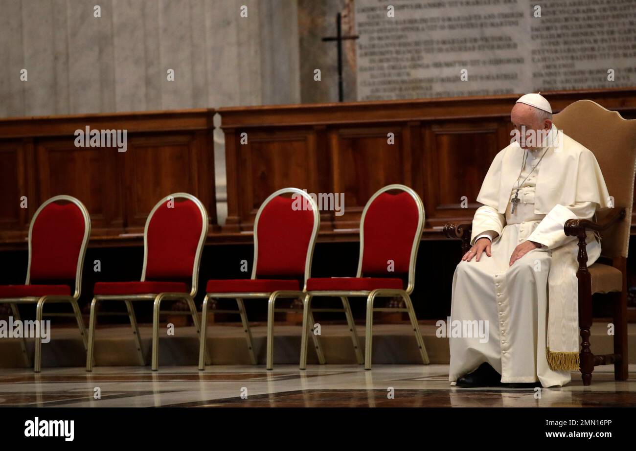Pope Francis sits during the funeral service of Cardinal Jean-Louis ...