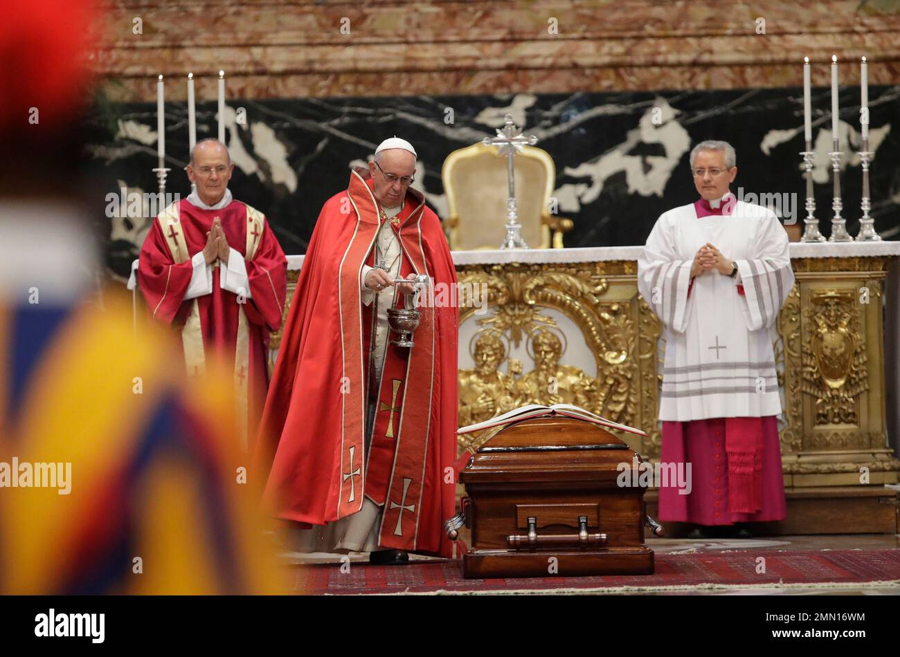 Pope Francis blesses the coffin of Cardinal Jean-Louis Tauran during ...