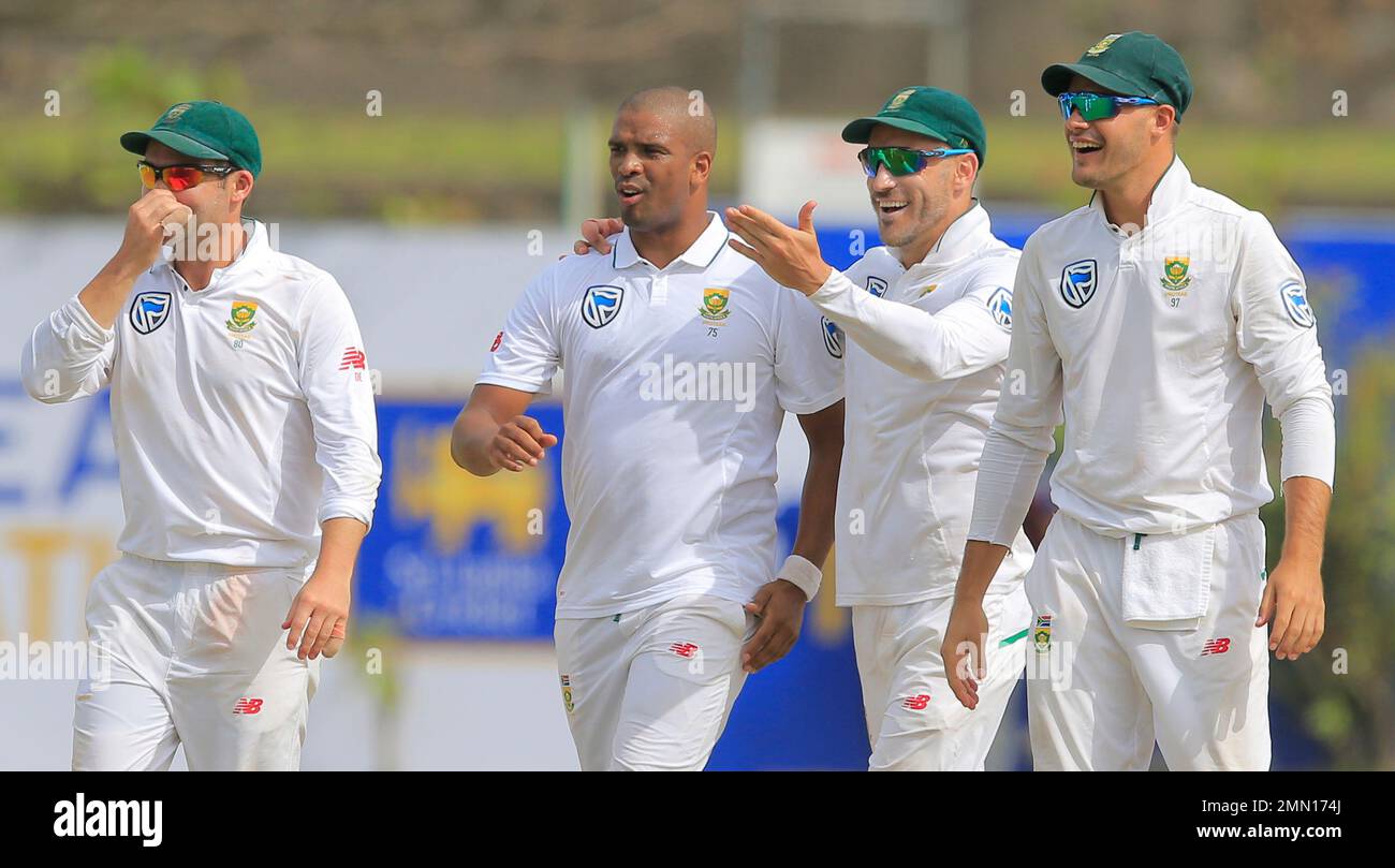 South Africa's Vernon Philander, second left, celebrates the wicket of ...