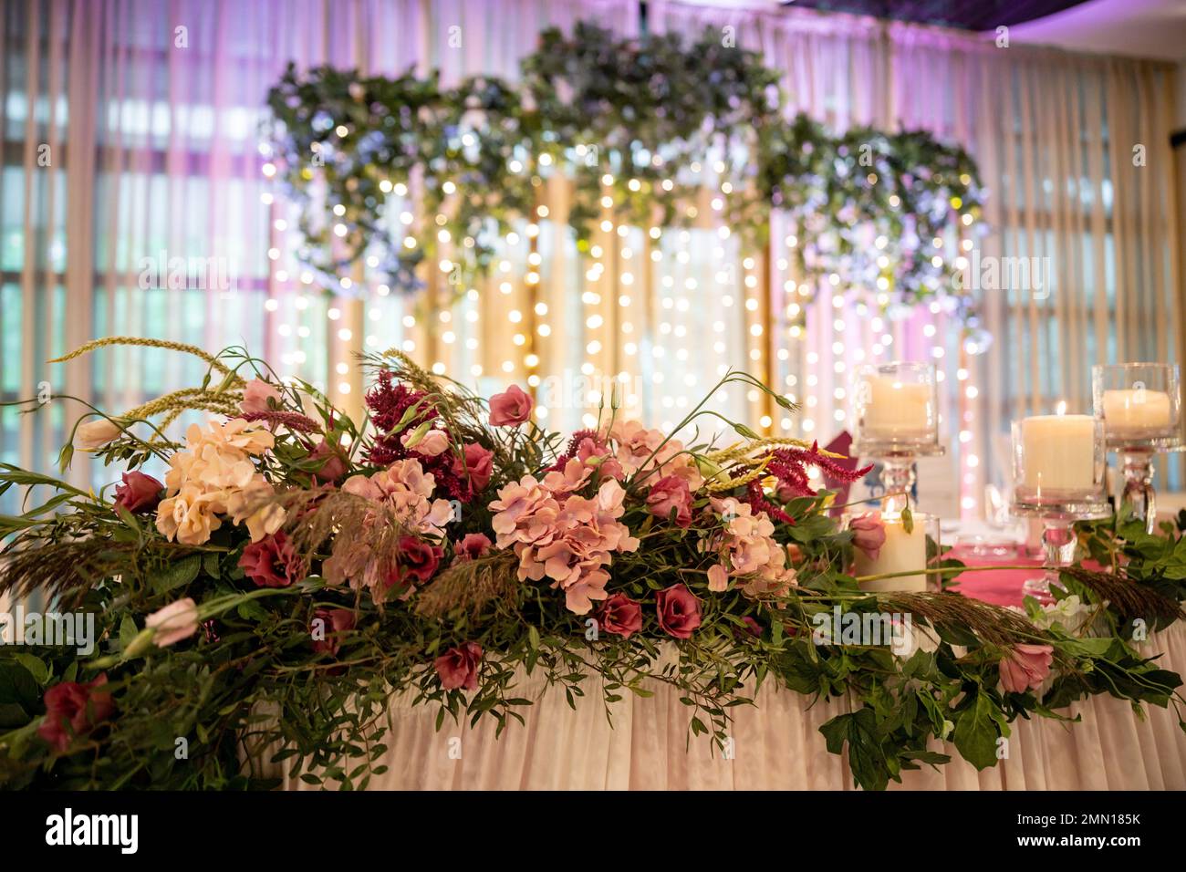 Wedding flowers set up in a restaurant. A wedding colorful bouquet ...