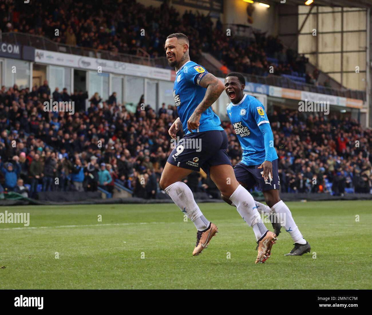 Jonson Clarke-Harris (PU) celebrates scoring the second goal for ...