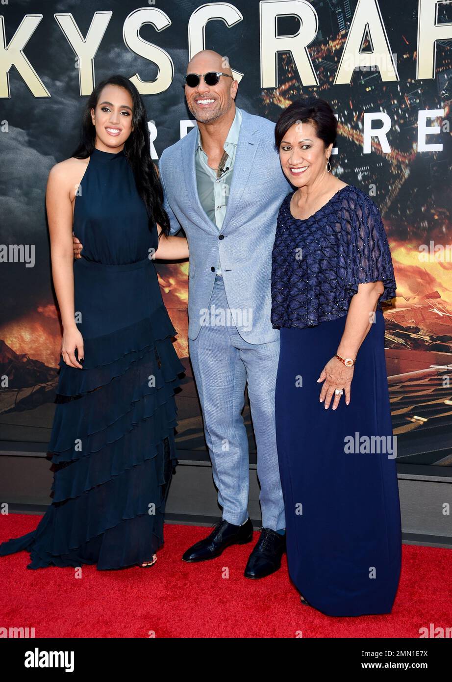 Actor Dwayne Johnson, center, poses with his daughter Simone Johnson ...