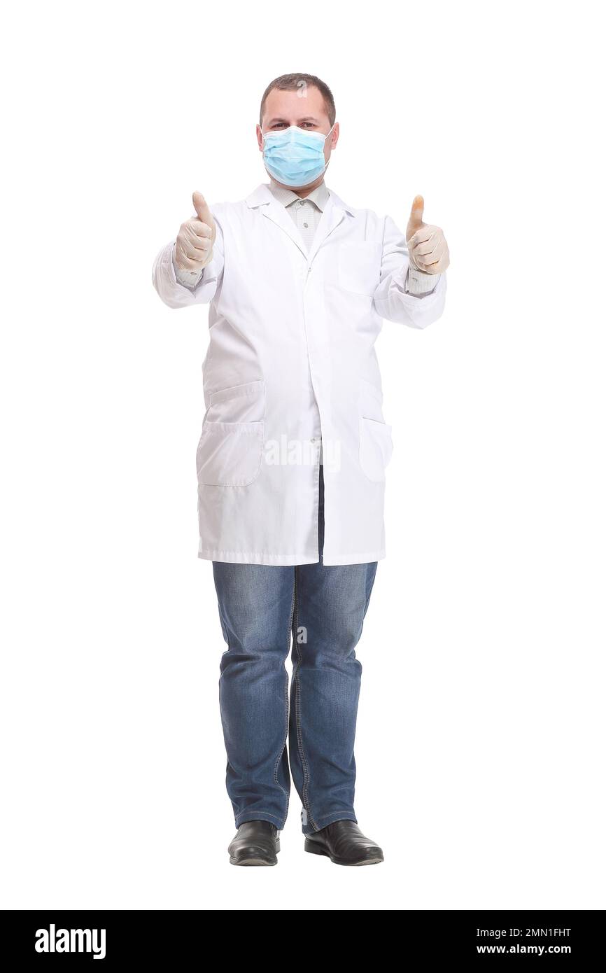 Doctor wearing a surgical mask against infections standing with crossed ...