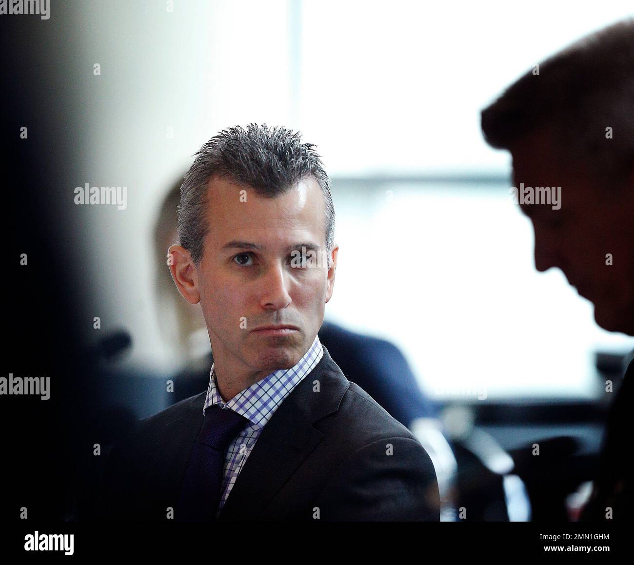 Max Schachter, left, father of shooting victim Alex Schachter listens ...