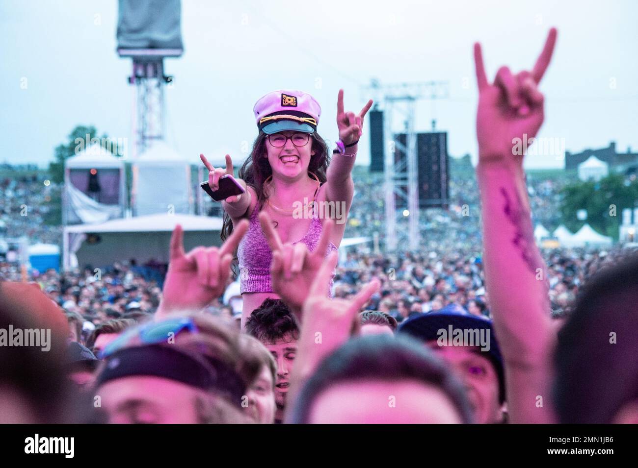 A festival goer attends the Festival d'ete de Quebec on Monday July 9 ...