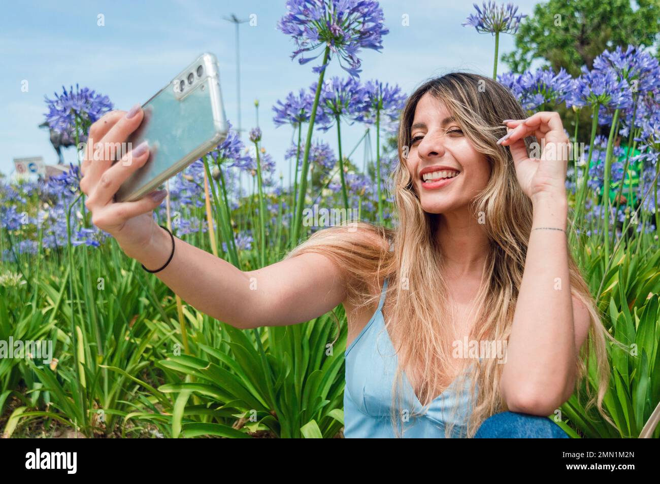 young latin woman of colombian ethnicity with long hair and blue ...