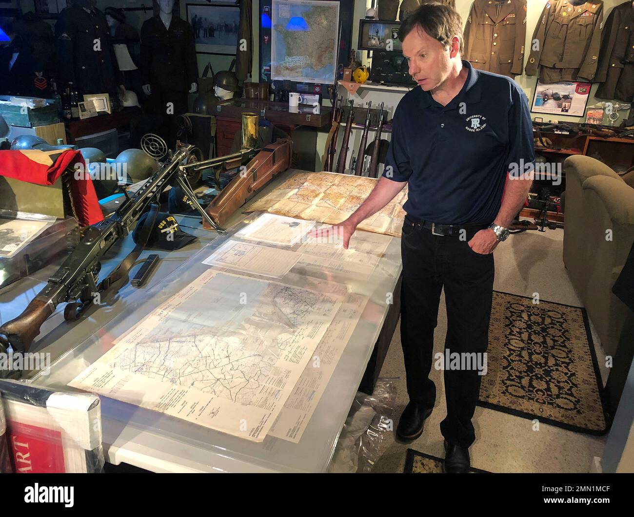 In this June 22, 2018 photo, filmmaker Tim Gray looks over maps from D ...
