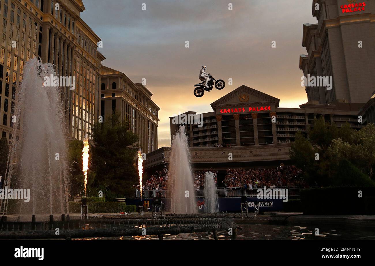 Travis Pastrana jumps the fountain at Caesars Palace on a motorcycle ...