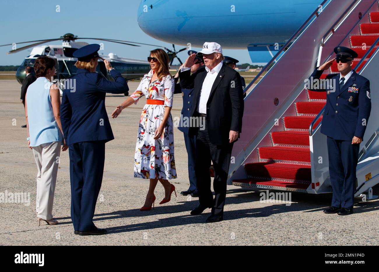 President Donald Trump and first lady Melania Trump are greeted by U.S ...