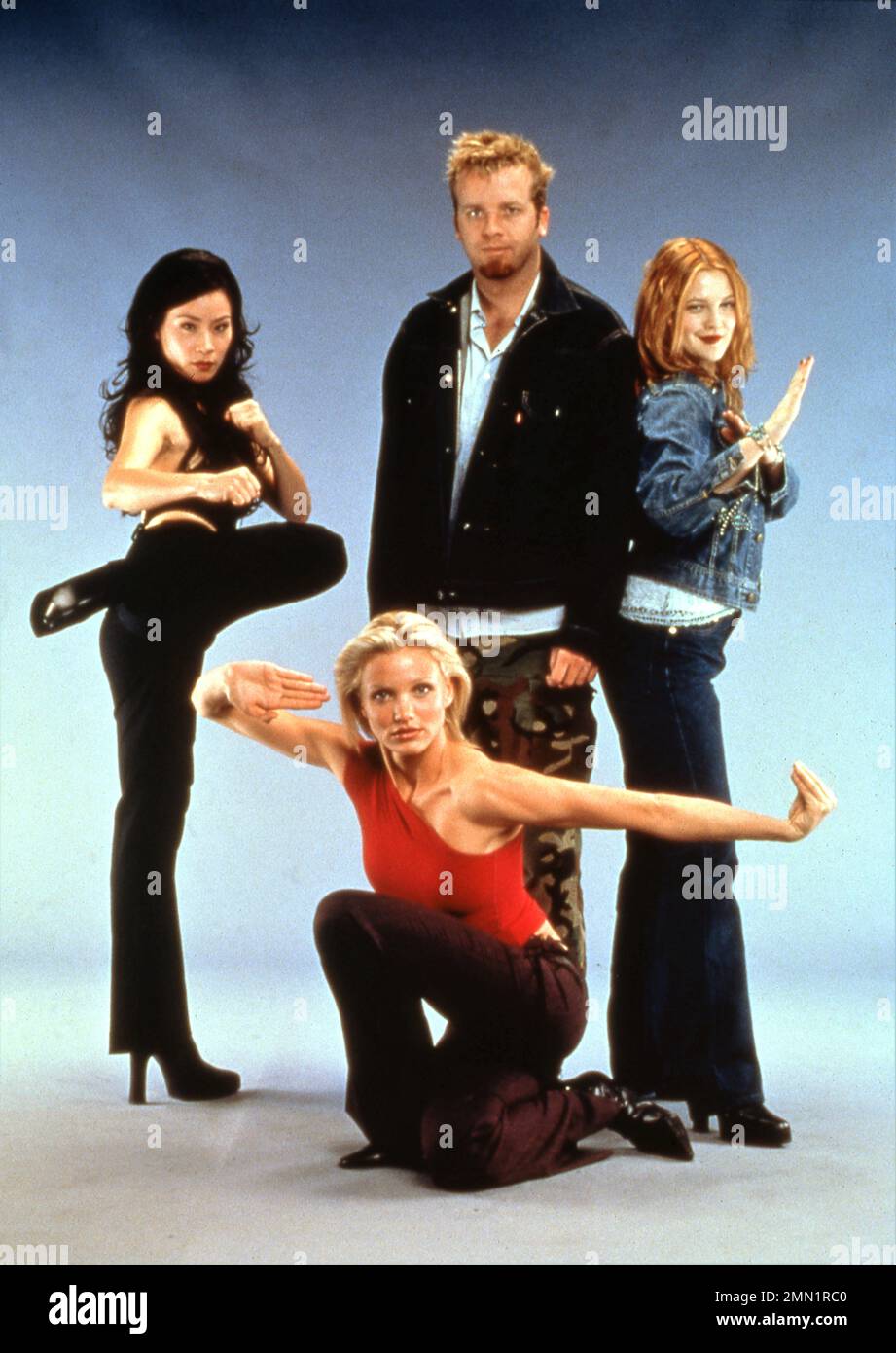 LUCY LUI CAMERON DIAZ and DREW BARRYMORE with Director McG publicity portrait for CHARLIE'S ...