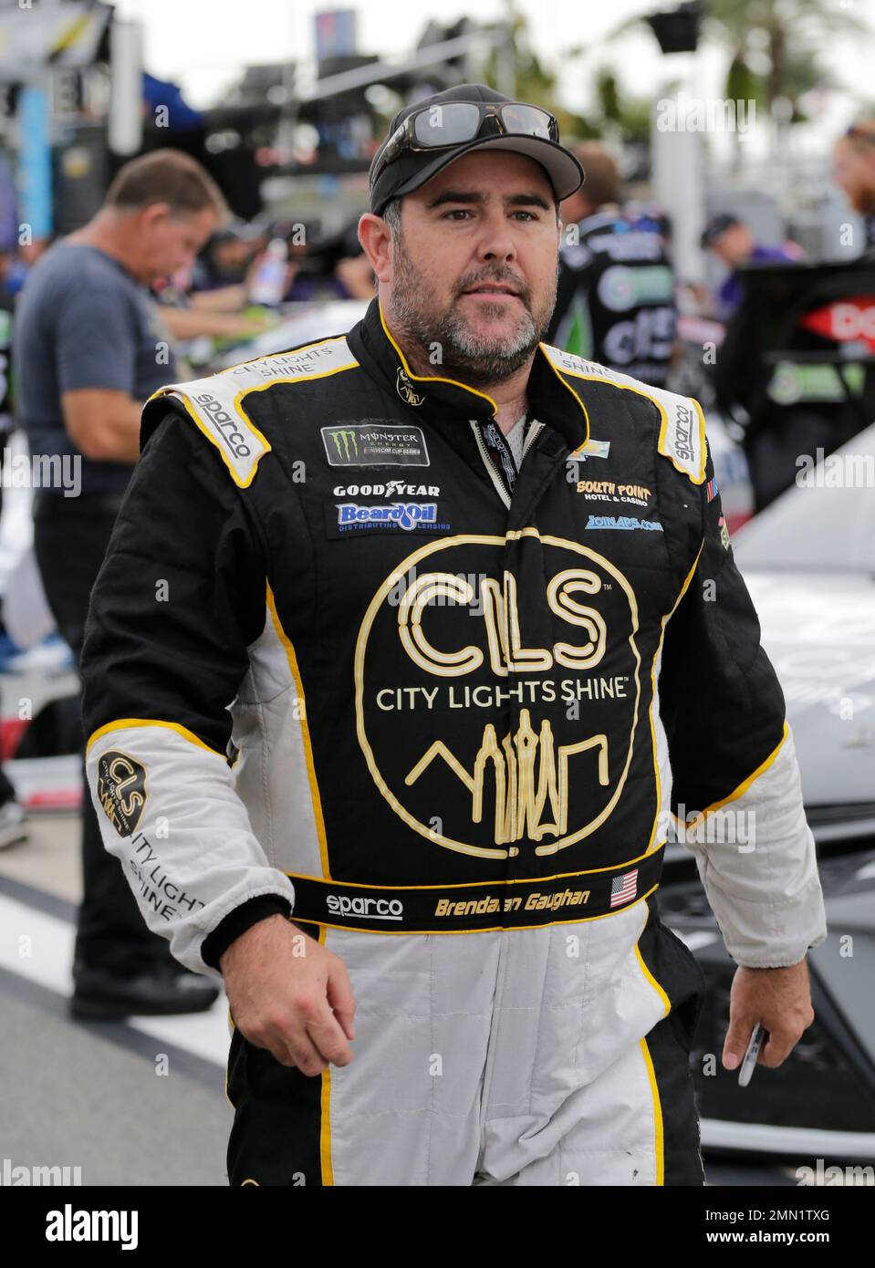 Brendan Gaughan walks on pit road before qualifying for a NASCAR Cup ...