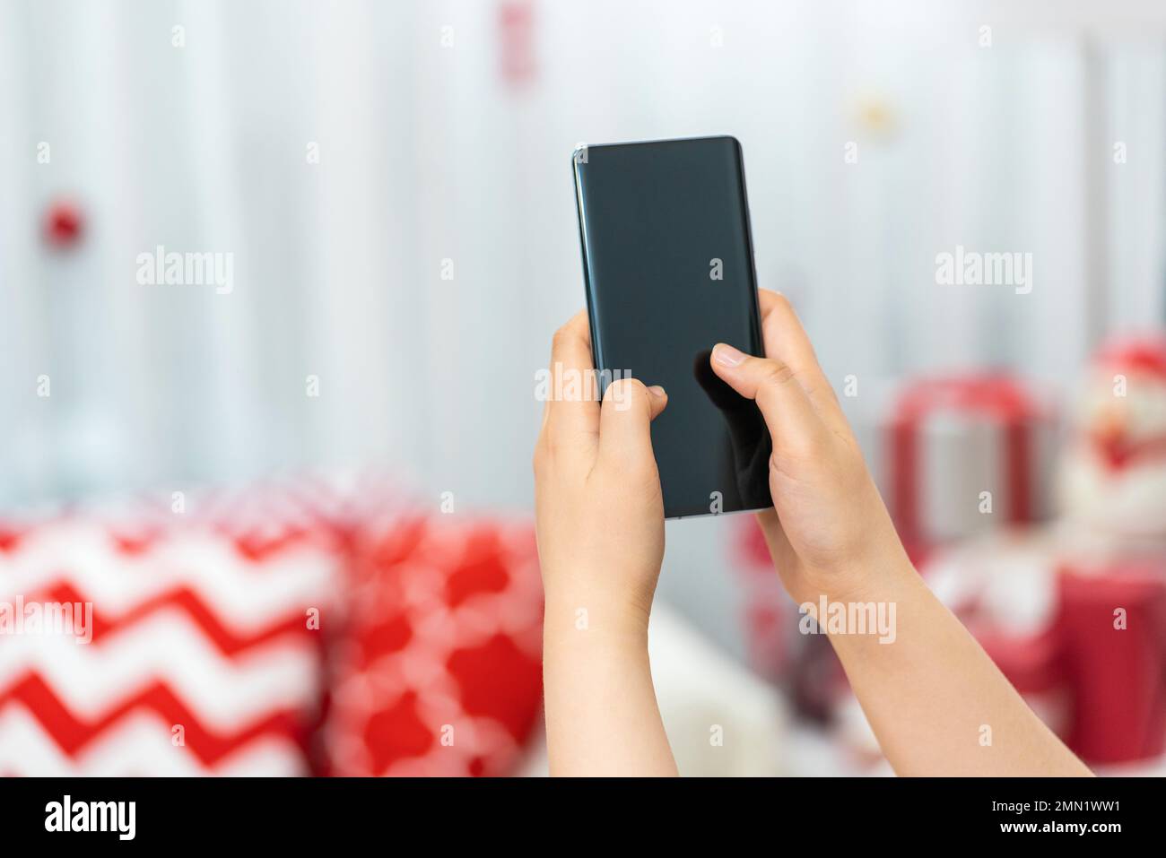 Mobile phones and hand Stock Photo - Alamy