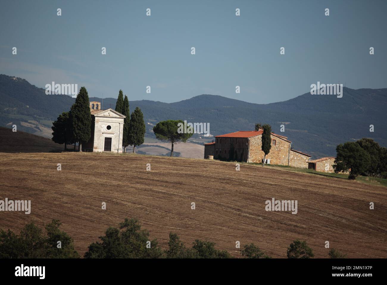 Farm buildings and chapel in rural Tuscany near Monticchiello, Italy ...