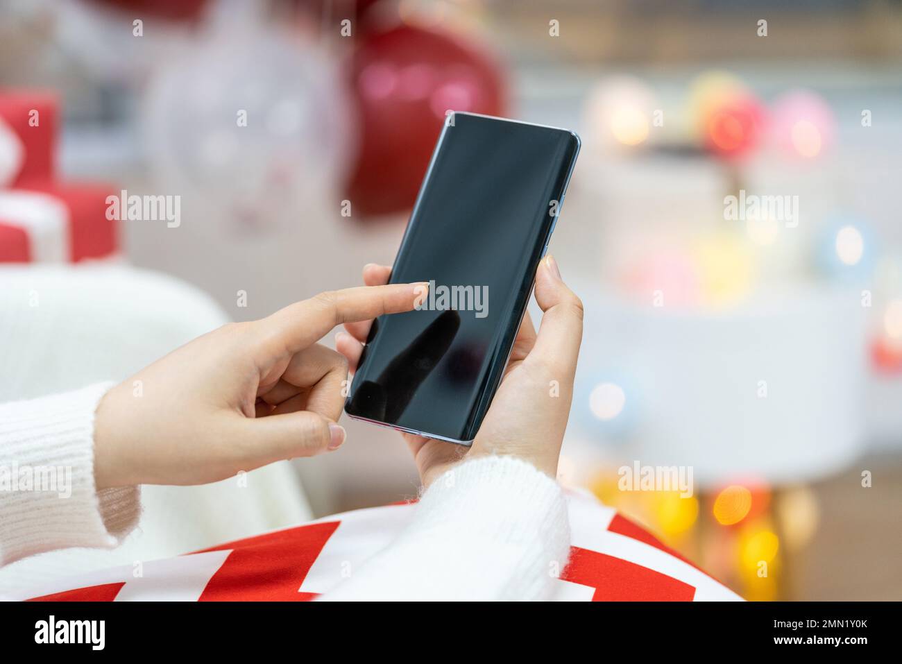 Mobile phones and hand Stock Photo - Alamy