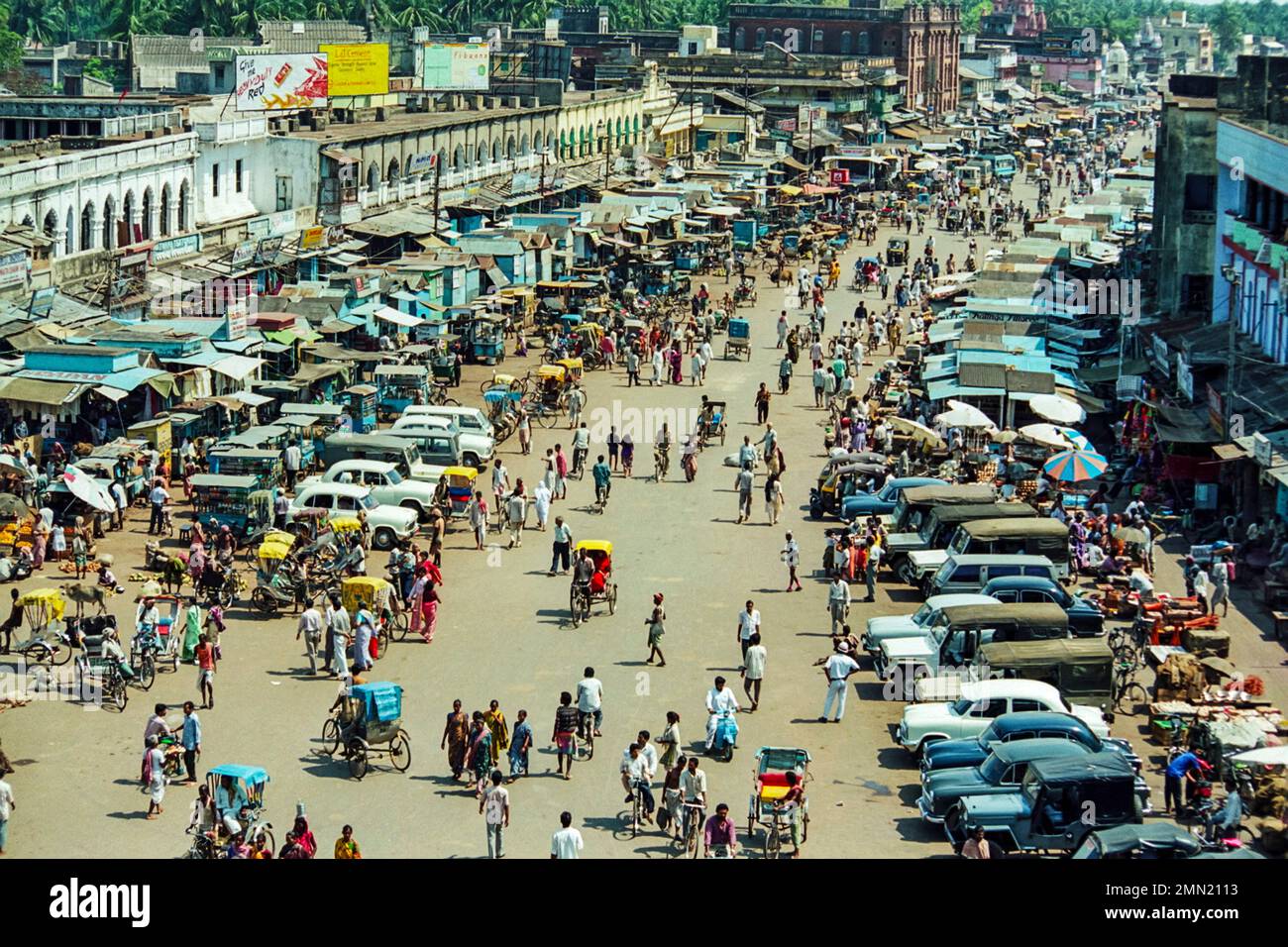 Crowded street in a commercial district of a small town in India in the ...