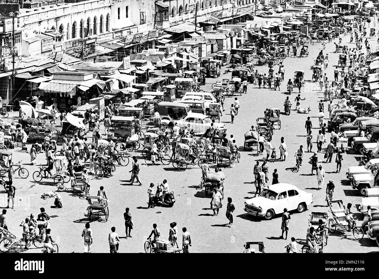 Crowded street in a commercial district of a small town in India in the ...