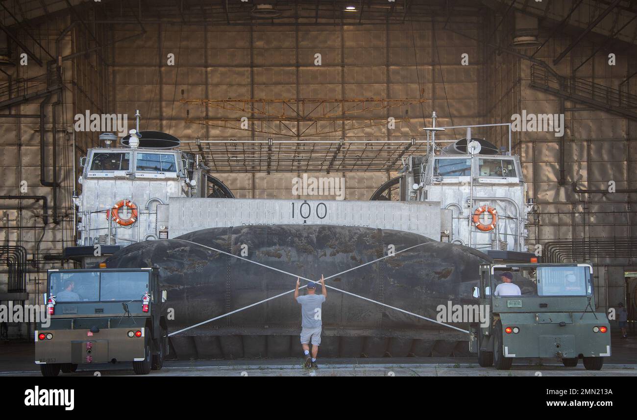 Skip Whitmore, Naval Surface Warfare Center Panama City, marshals a ...