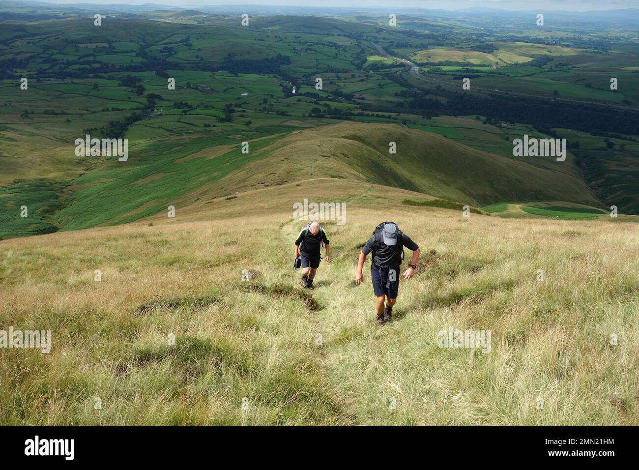 Two Men Walking 'Whin's End' to 'Fell Head' one of the Howgilll Hills ...