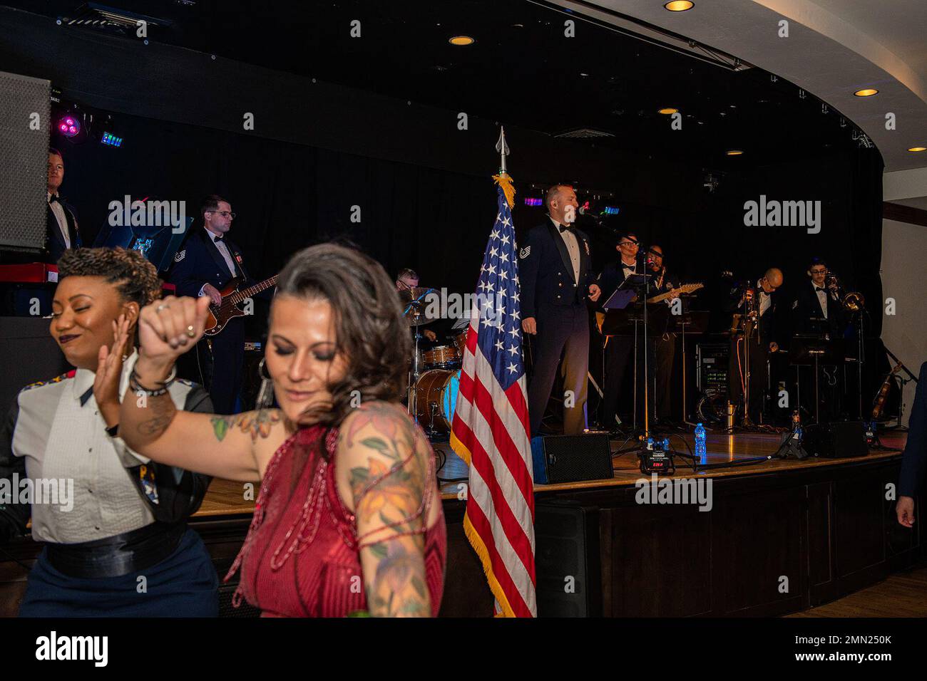 Buckley Space Force Base members dance while The Air Force Academy Band ...