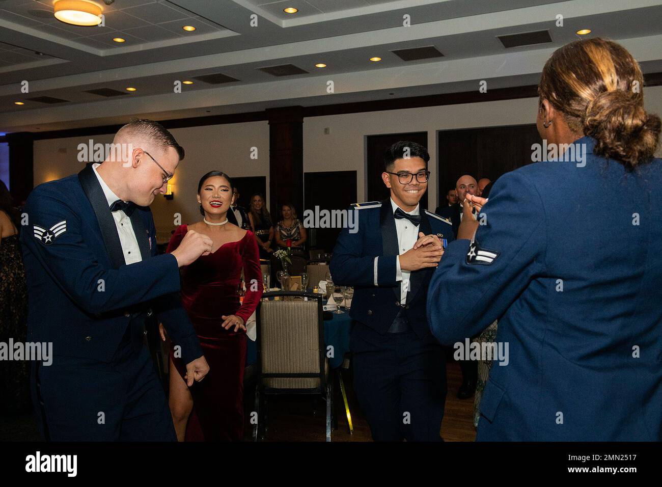 Buckley Space Force Base members dance while The Air Force Academy Band ...