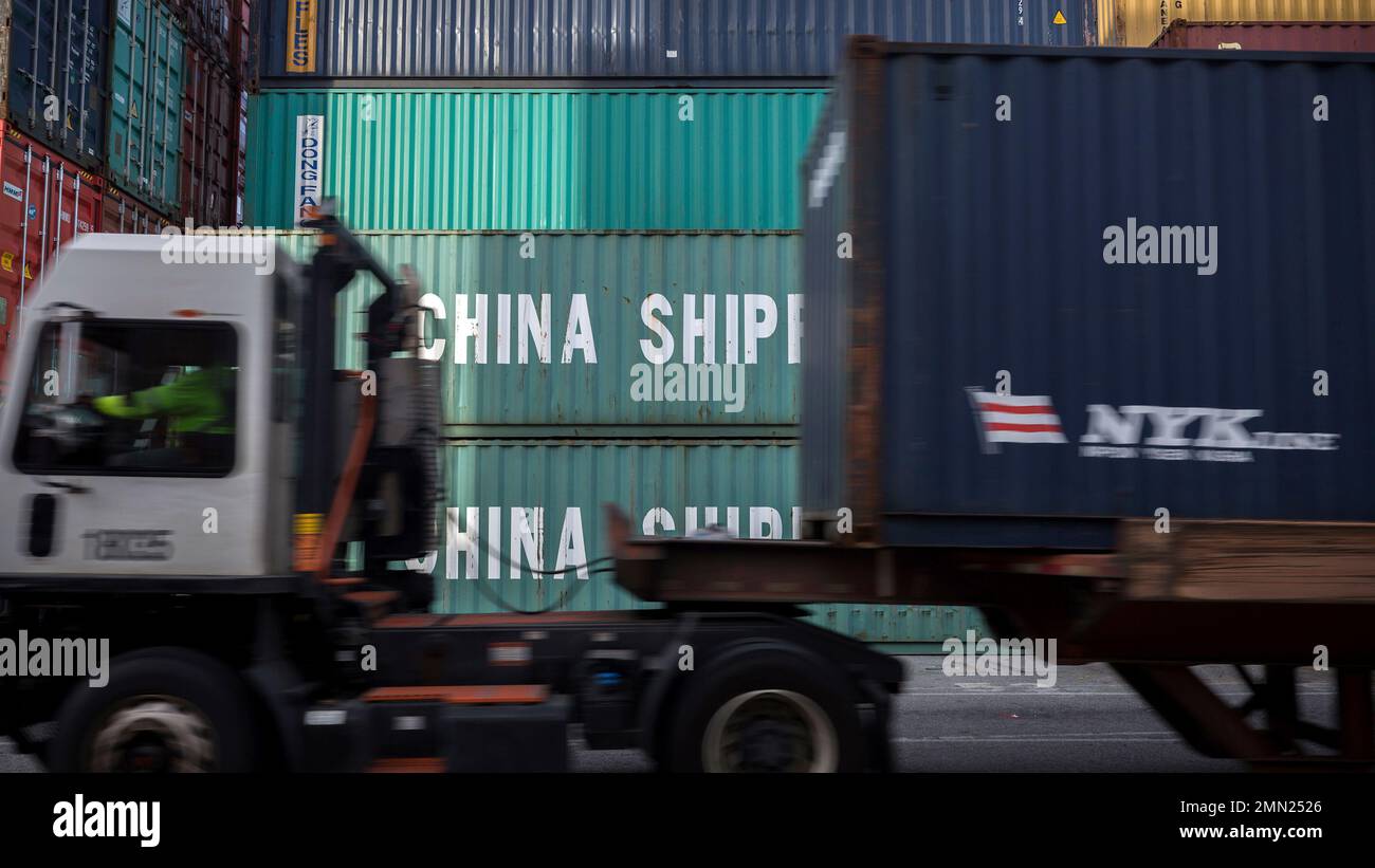 In this July, 5, 2018 photo, a jockey truck passes a stack of 40-foot ...