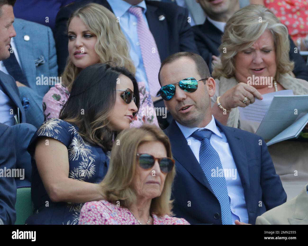 Spanish golfer Sergio Garcia and his wife Angela Garcia sit in the ...