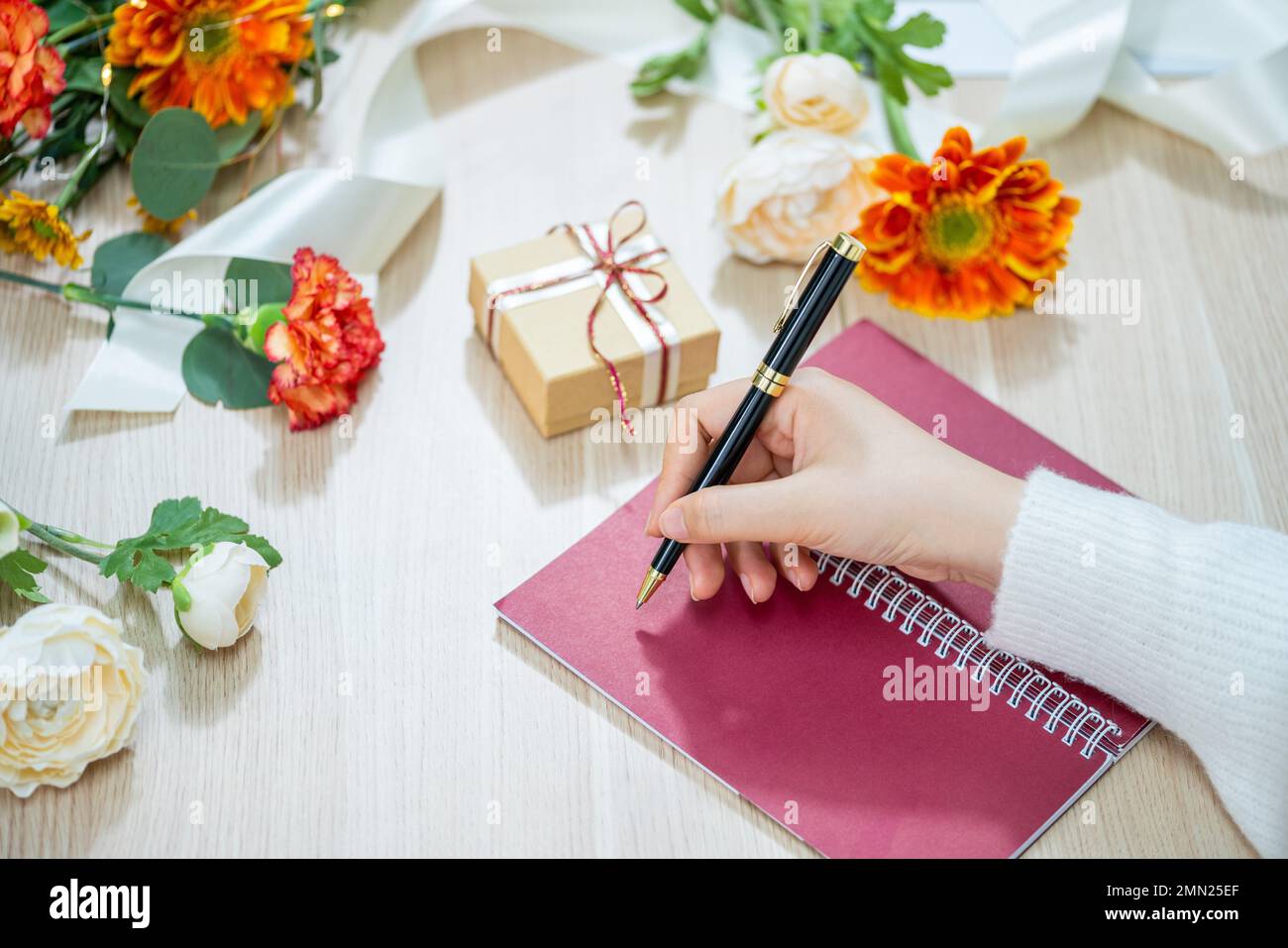 The young woman to write CARDS Stock Photo - Alamy