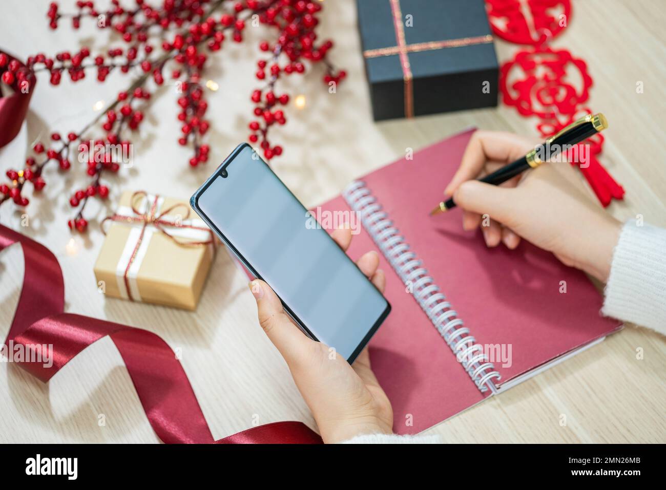 Woman write red pen hi-res stock photography and images - Alamy