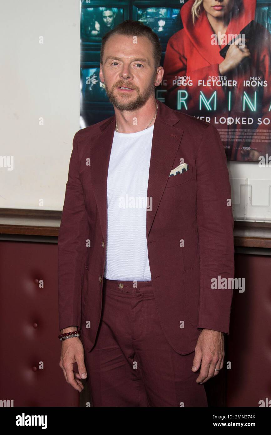 Actor Simon Pegg poses for photographers upon arrival at the UK ...