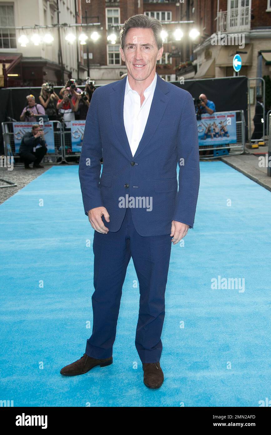 Actor Rob Brydon poses for photographers upon arrival at the UK ...