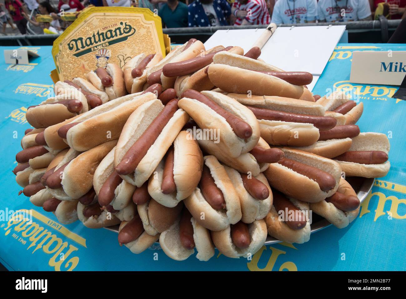 Hot dogs are on display on stage ahead of the Nathan's Famous Fourth of ...