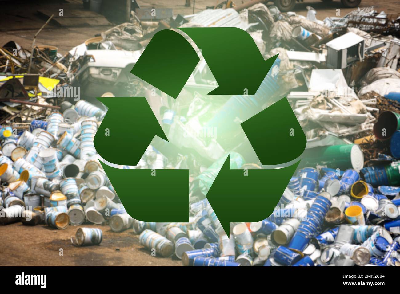 Recycle symbol on a background of metal waste disposal Stock Photo - Alamy